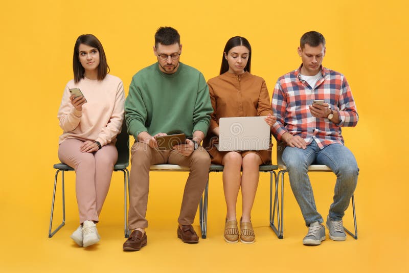People Waiting for Job Interview on Yellow Background Stock Image ...