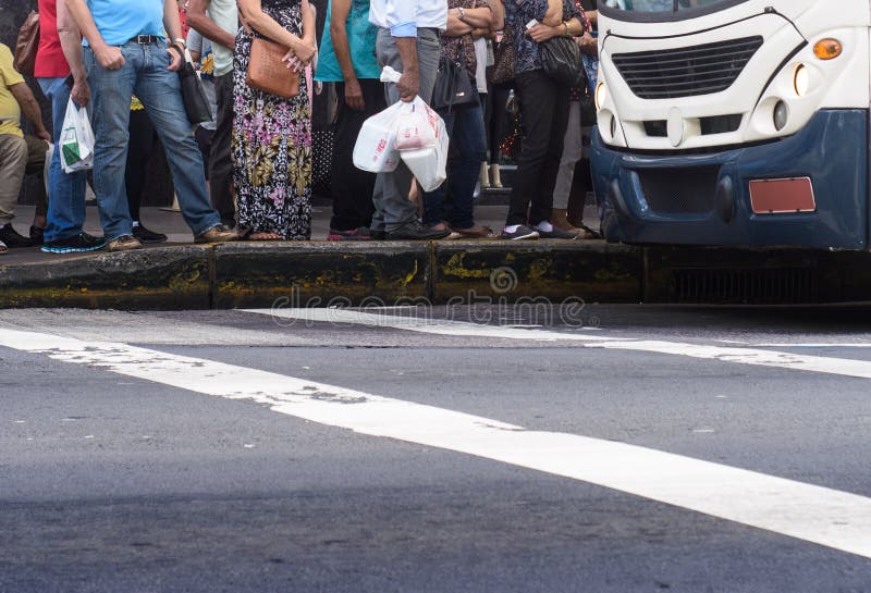 People Waiting in Line at the Bus Stop in Brazil Stock Photo - Image of ...