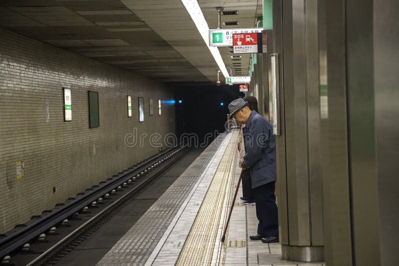 People Waiting for the Subway on a Platform in Osaka Editorial ...