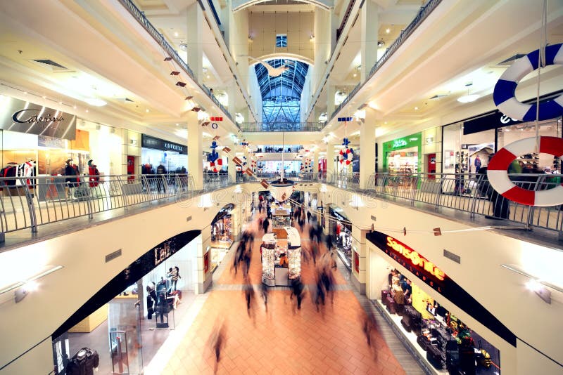 People walk in Atrium Mall editorial stock photo. Image of center ...