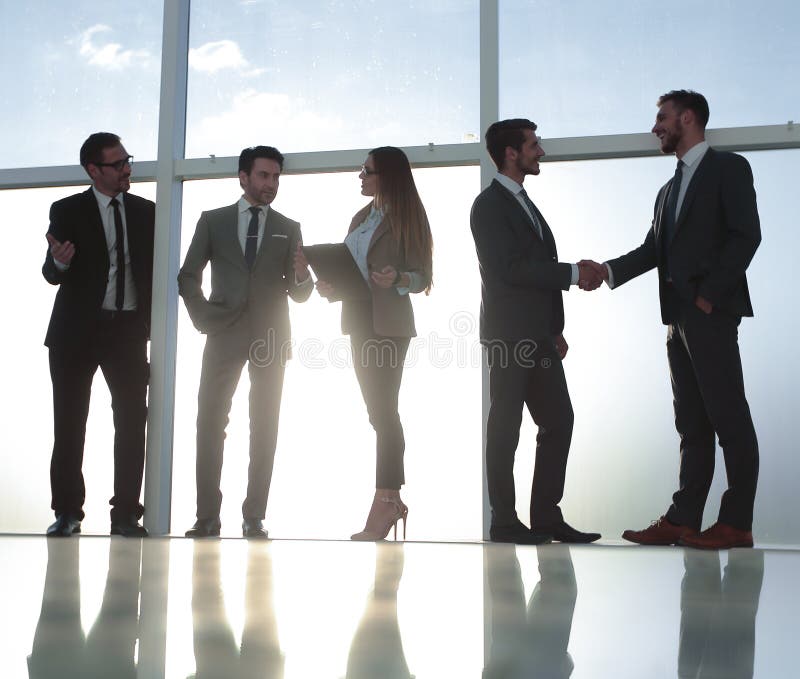 People Walk in the Office on the Sunny Background Stock Image - Image ...