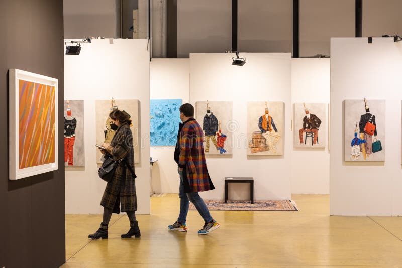 People Walking and Admiring Paintings in a Modern Art Gallery Editorial ...