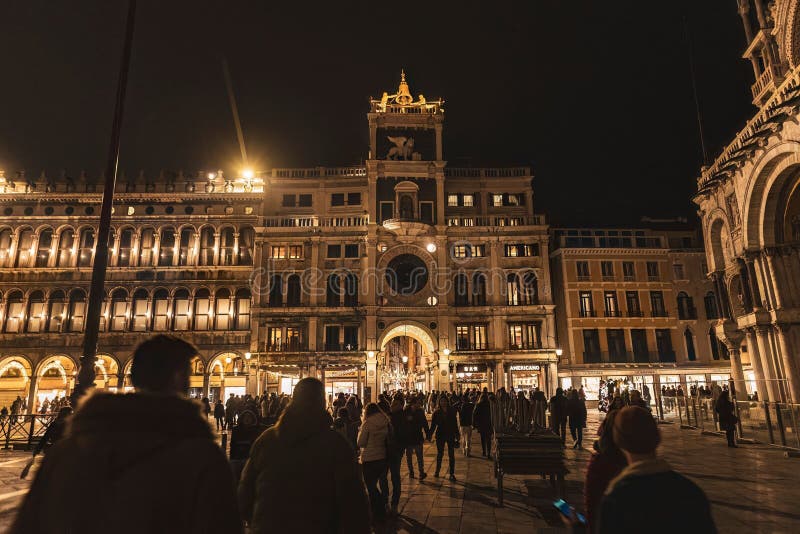 People Walking Around the Plaza at Night in Front of a Palace Editorial ...