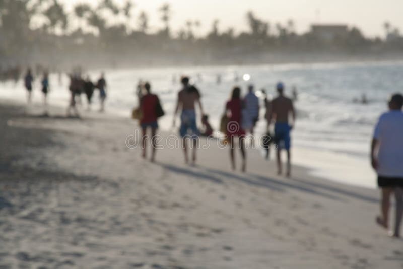 People Walking on the Beach Stock Photo - Image of horizontal, walking ...