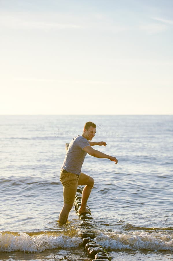 People Walking on the Beach in the Ocean Stock Image - Image of sand ...