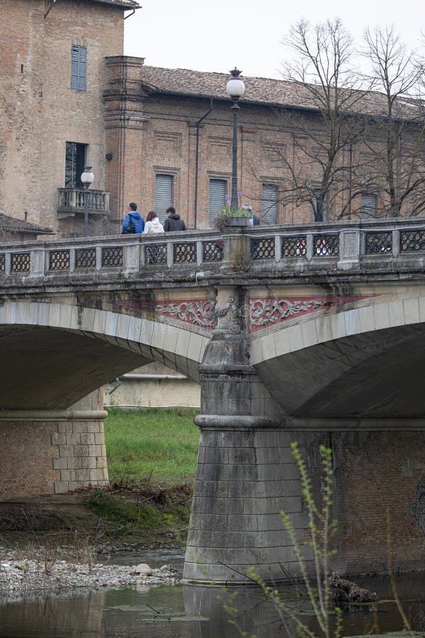 People Walking on the Bridge in the Center of Parma on a Spring Day ...