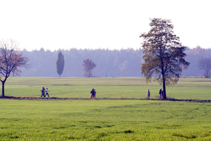 People Walking through Countryside. Stock Photo - Image of walking ...