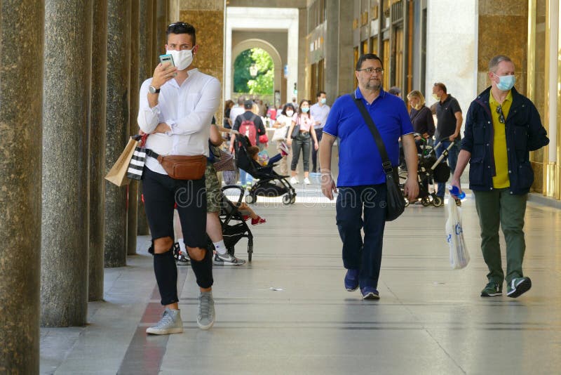 People Walking Downtown after the Lockdown Ends Wearing Protective Mask ...