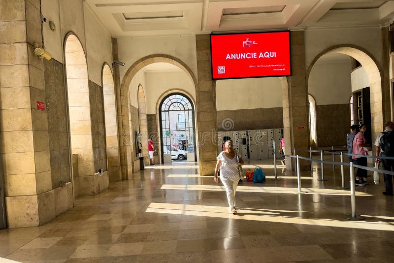 People Walking Inside Santa Apolonia Railway Station in Lisbon ... People Walking Inside Santa Apolonia Railway Station in Lisbon ...