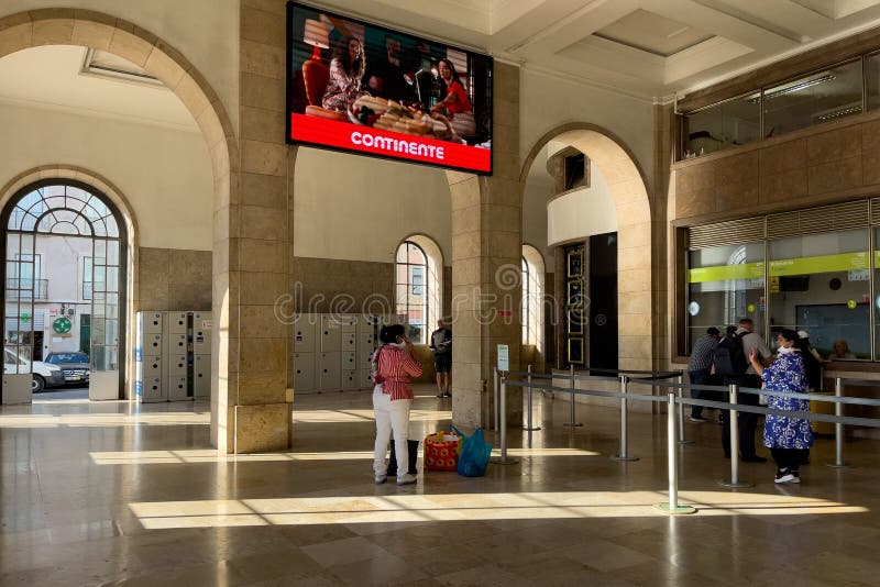 People Walking Inside Santa Apolonia Railway Station in Lisbon ... People Walking Inside Santa Apolonia Railway Station in Lisbon ...