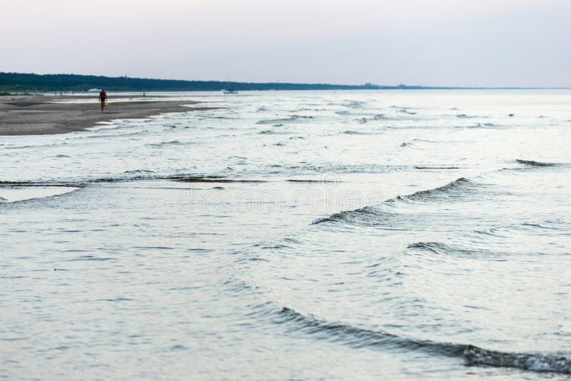 People Walking on the Sandy Beach in Sunset Stock Photo - Image of sand ...