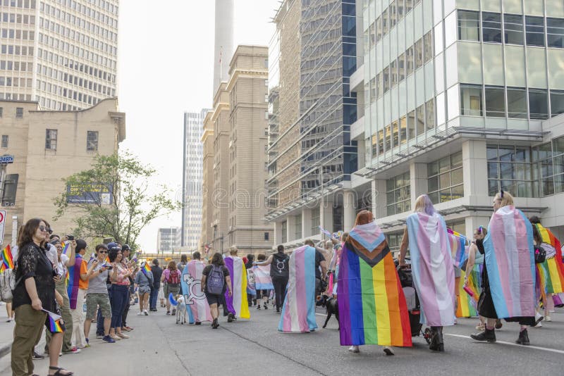 People Walking with 2SLGBTQ+ Flags on during Calgary Pride Parade in ...