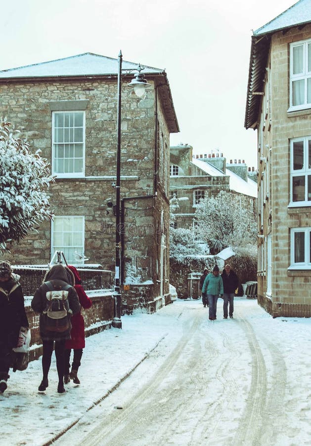 People Walking On Snow Covered Street Stock Image - Image of gloom ...