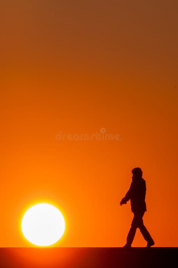 People walking at sunset stock image. Image of nature - 30556963