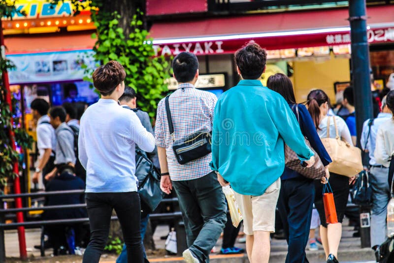 People walking in Tokyo editorial stock image. Image of walking - 149581679