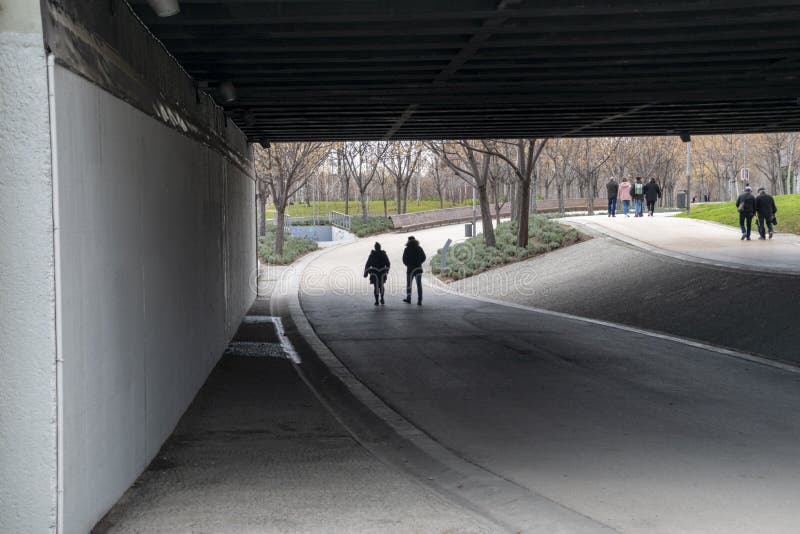 People Walking Under a Bridge. Madrid Rio Editorial Stock Photo - Image ...