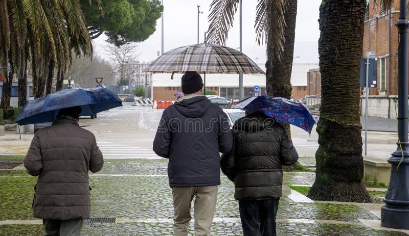 People Walking Under the Rain Covered by a Umbrella Stock Image - Image ...
