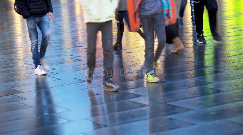 People Walking on Wet Pavement Stock Photo - Image of pavement ...