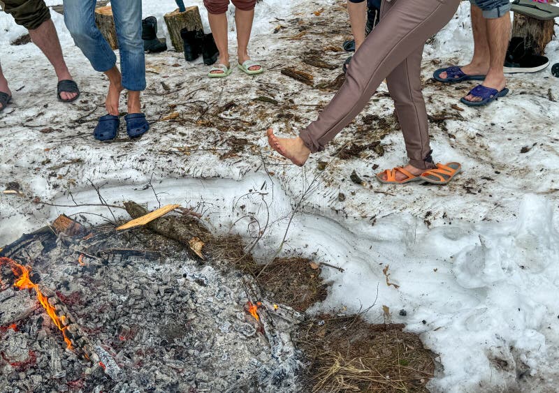 People Warm Their Feet by the Fire in Winter Stock Image - Image of ...