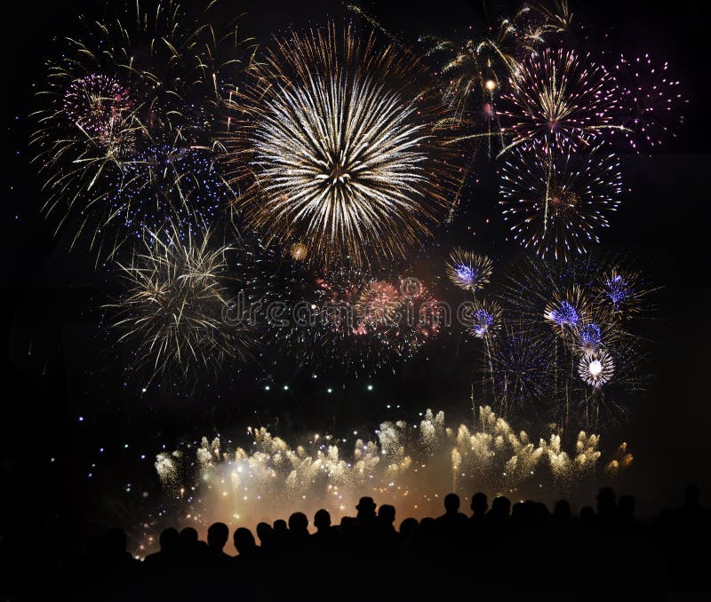 Group of People Enjoying Spectacular Fireworks Show in a Carnival or ...