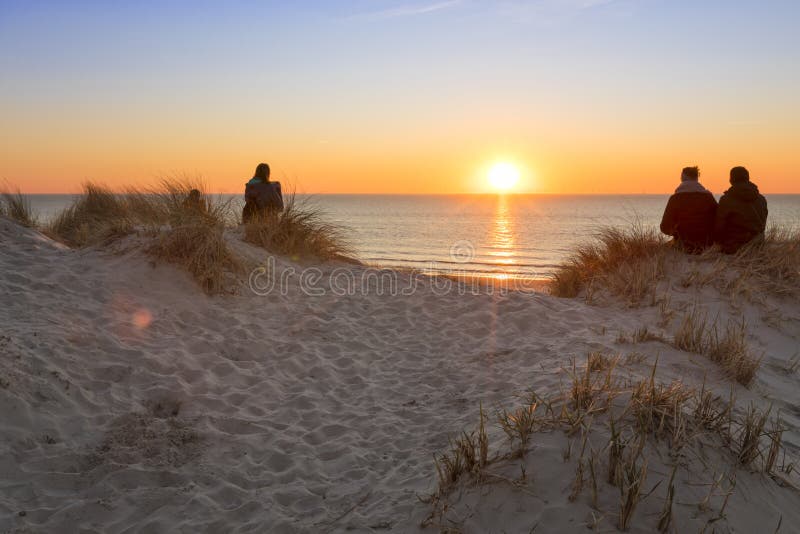 People Watching the Sunset at Danish North Sea Beach Stock Image ...