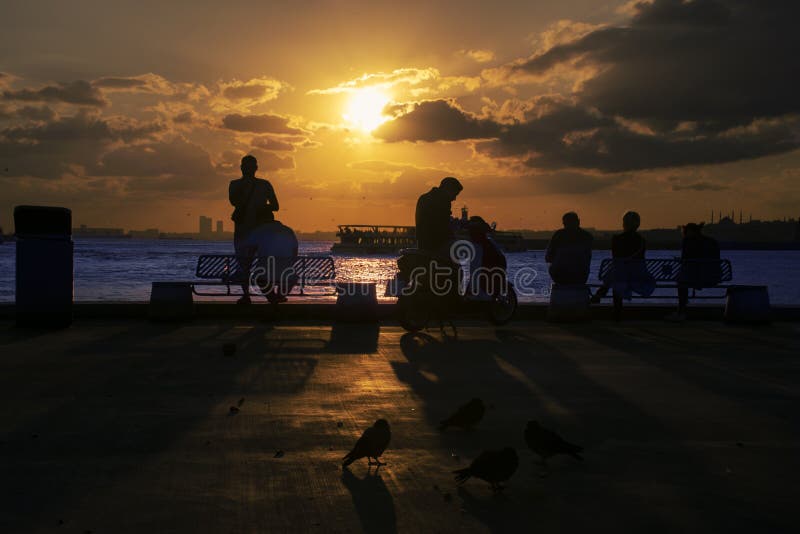 People watching the sunset editorial photography. Image of friends ...