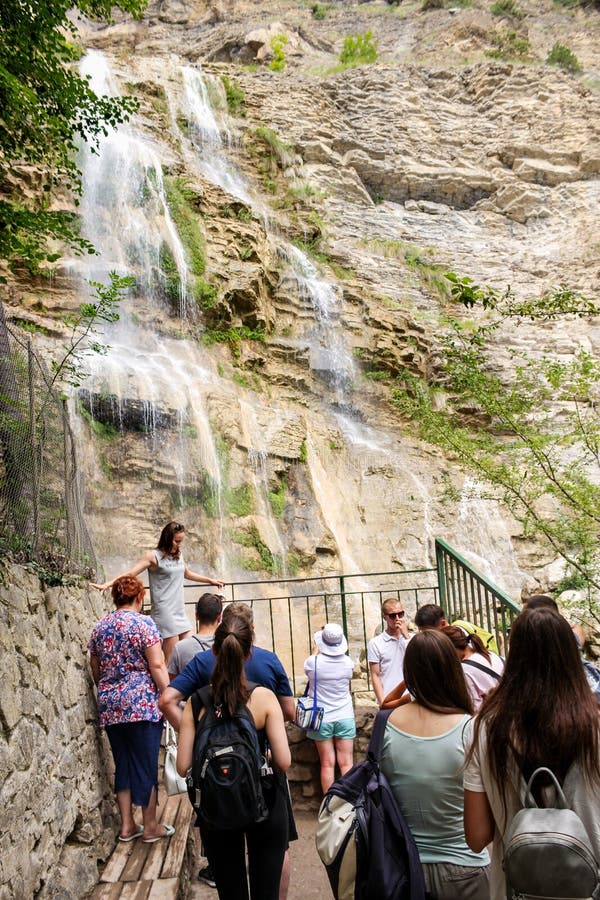 People at the waterfall editorial image. Image of handsome - 141976250