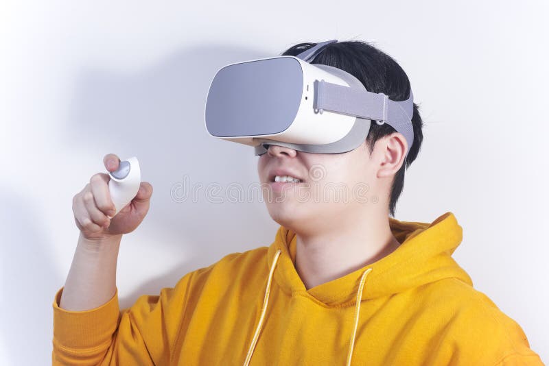 People Who are Playing Vr Virtual Reality and Wearing Glasses Show a ...