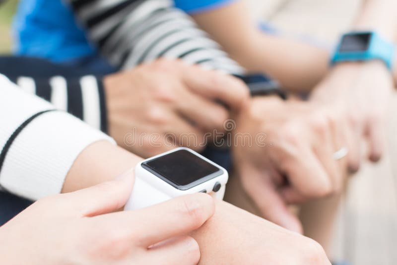 People wearing smartwatch stock image. Image of people - 71843037