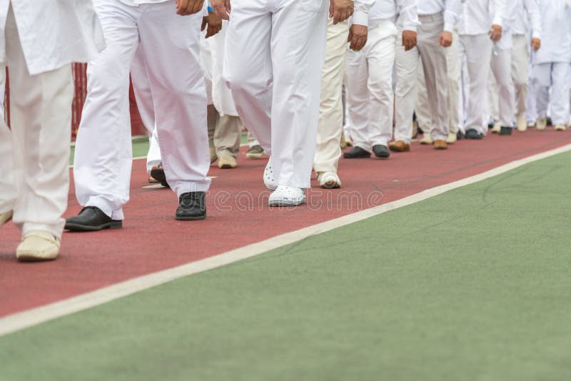 People in White Clothes are Walking Along the Stadium Stock Photo ...