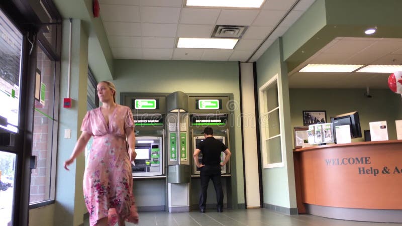 People Withdrawing Money at ATM Machine Inside TD Bank Stock Video ...