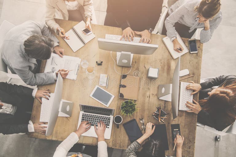 People Working Around a Table Stock Photo - Image of group, businessman ...