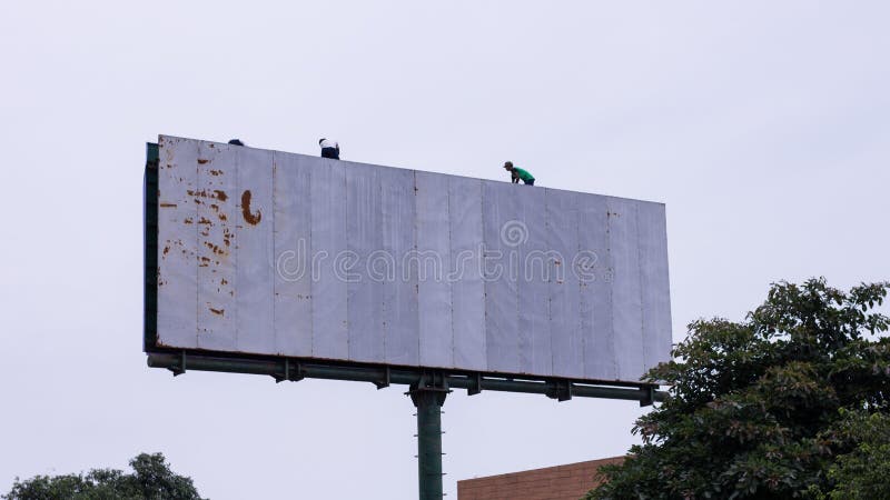 People Working on Big Billboard Stock Photo - Image of downtown ... People Working on Big Billboard Stock Photo - Image of downtown ...