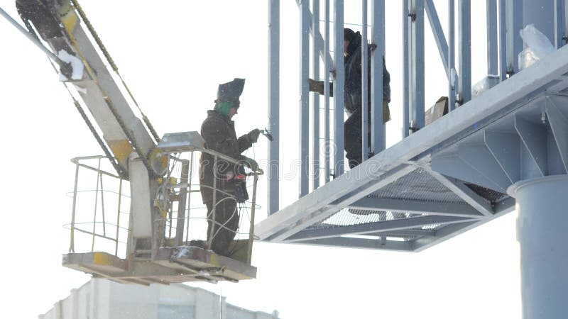 People Working Building New Big Billboard. Worker Repairing Billboard ... People Working Building New Big Billboard. Worker Repairing Billboard ...