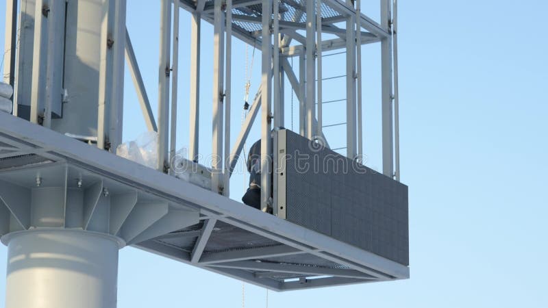 People Working Building New Big Billboard. Worker Repairing Billboard ... People Working Building New Big Billboard. Worker Repairing Billboard ...
