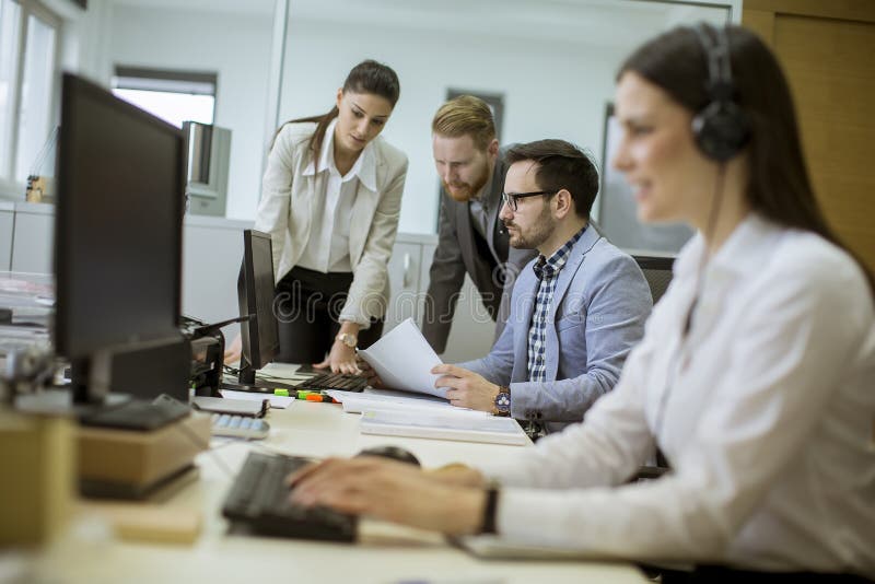 People Working in a Busy Office Stock Image - Image of listening ...
