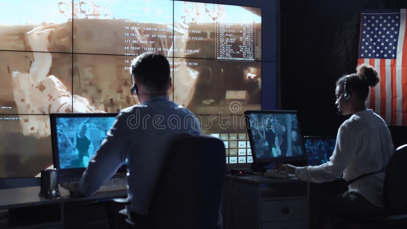 People Working in Mission Control Center Stock Image - Image of control ...
