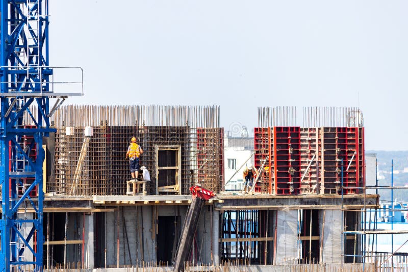 People are Working Ona Construction Site. Builders in Action Stock ...