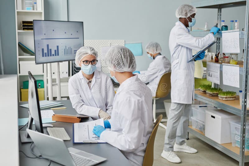 People Working in Team in the Laboratory Stock Photo - Image of biology ...