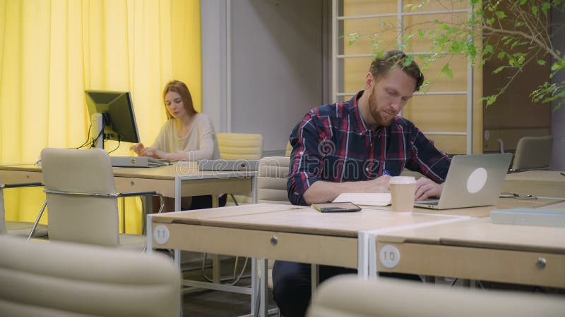 People in the Workplace in a Beautiful Yellow-green Office Stock Photo ...