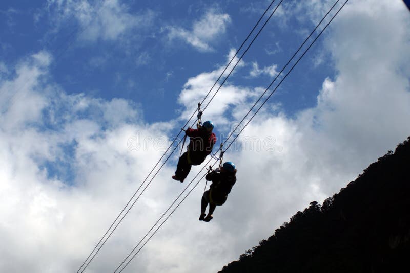 People on a zip line editorial stock image. Image of america - 157540399