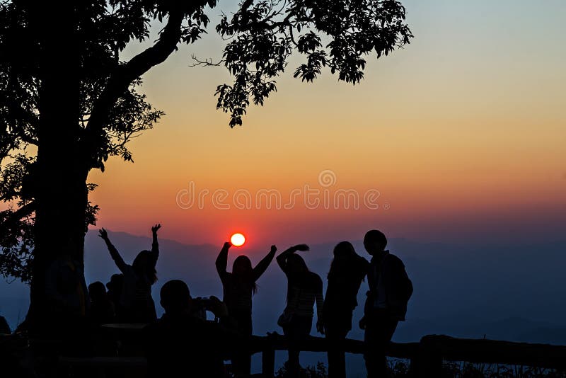 Peoples Had Happy Motion, Silhouetted with Sunset Stock Image - Image ...