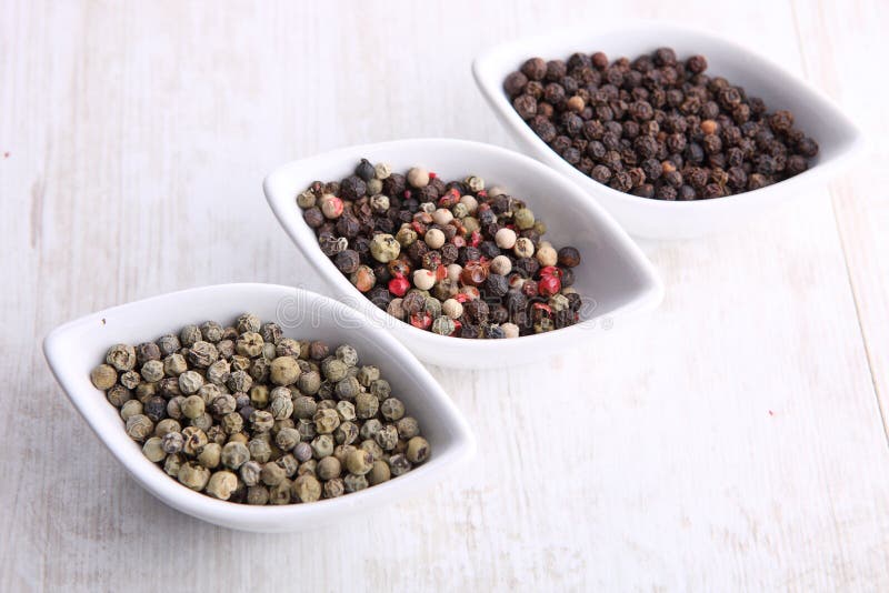 Pepper grains in bowls stock image. Image of spices, multicoloured ...