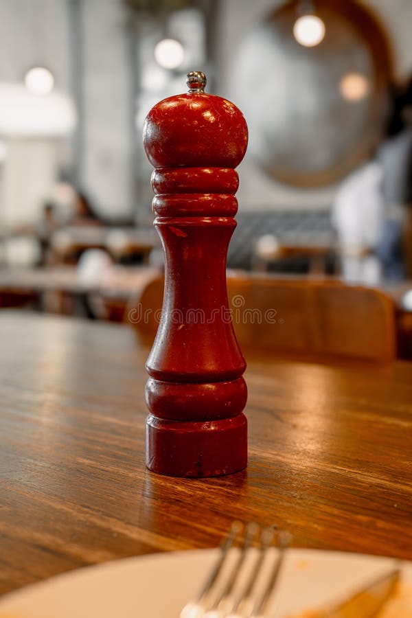 A Pepper Grinder Placed on the Table. Stock Photo - Image of grinder ...