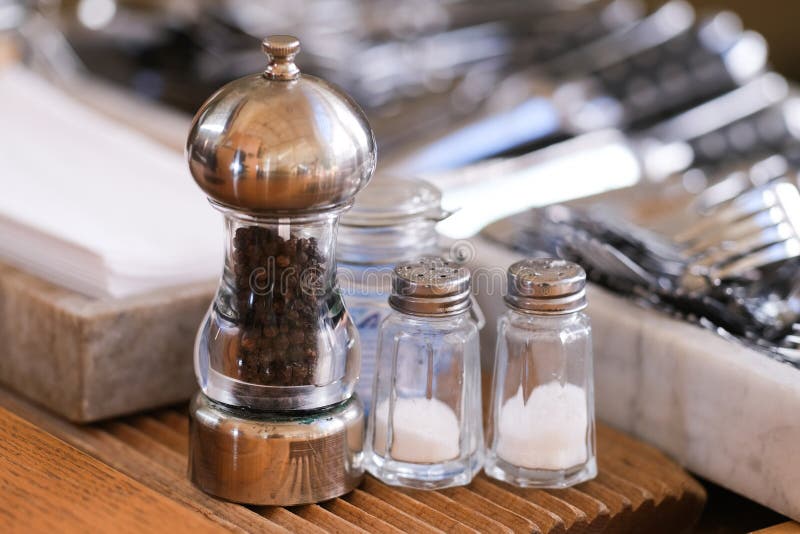 Pepper mill and salt stock image. Image of seasoning - 380597995