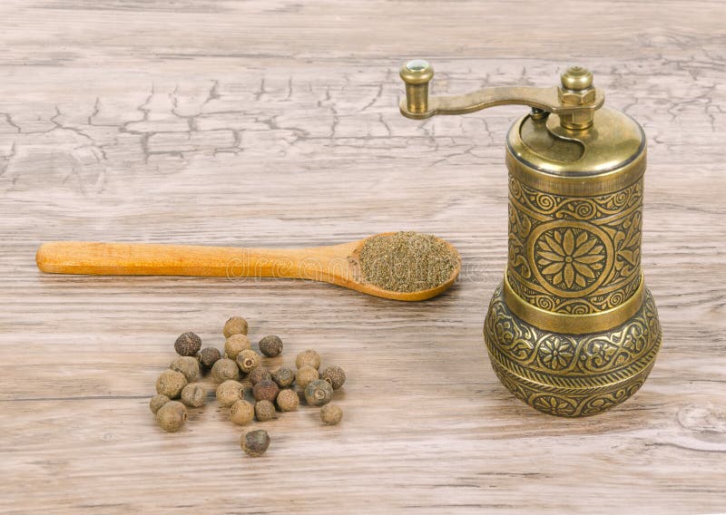 Pepper and mill and spoon stock image. Image of seed - 54246871