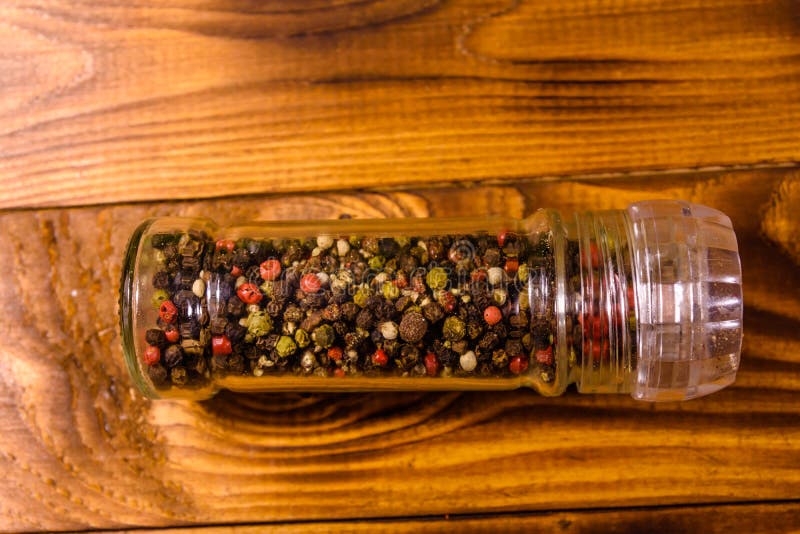 Pepper Mill on the Wooden Table Stock Image - Image of glass, healthy ...