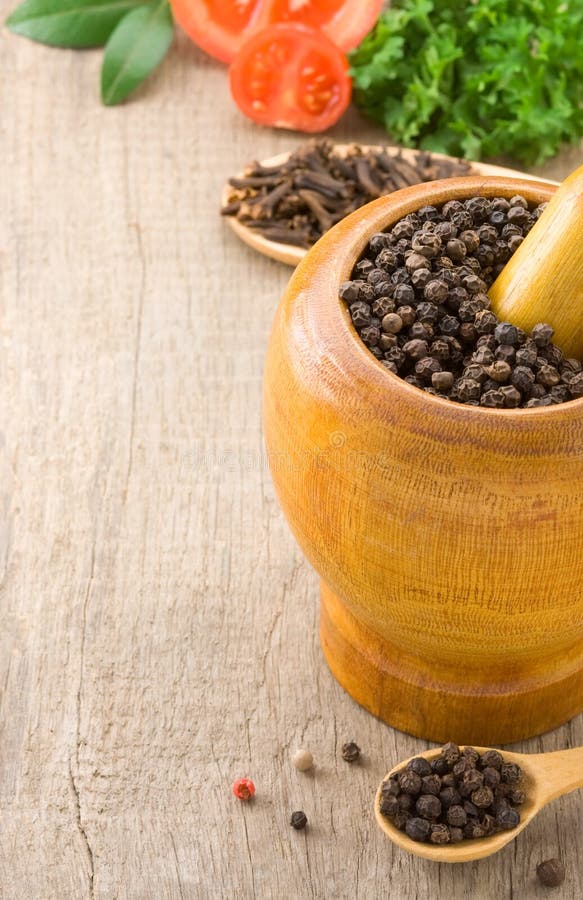 Pepper in Mortar with Pestle and Spices Stock Photo - Image of pestle ...