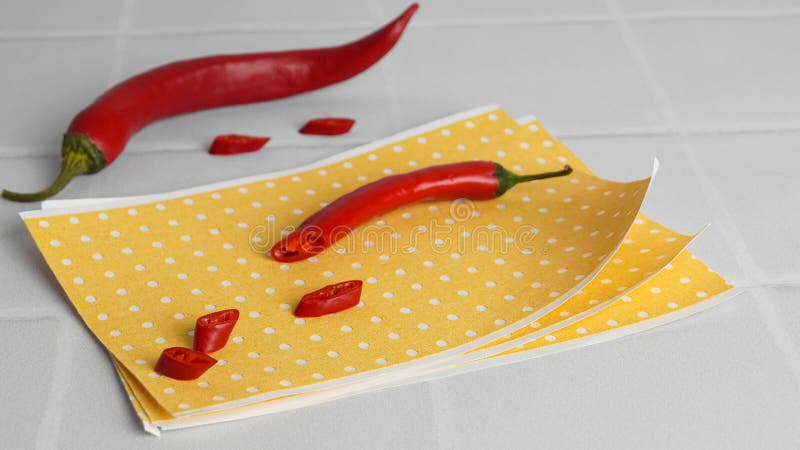Pepper Plaster and Chili on White Tiled Table, Closeup Stock Image ...