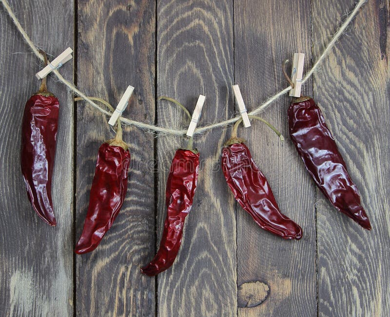 Pepper Red Sharp on a Rope with Clothespegs Stock Image - Image of food ...